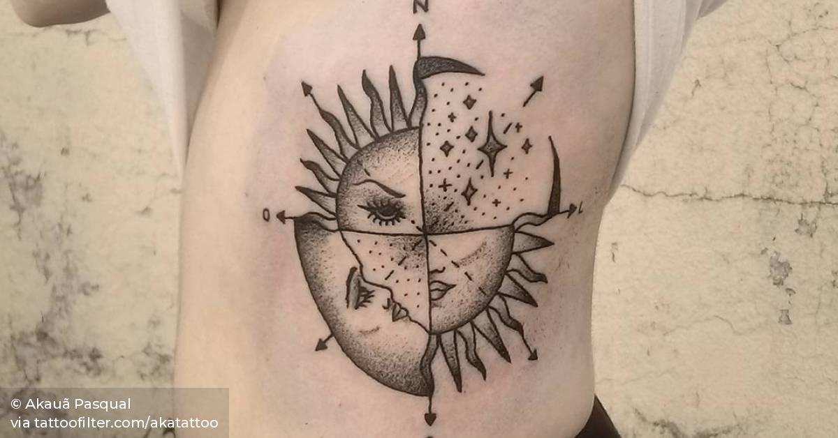 Moon/sun compass tattoo on the ribcage.