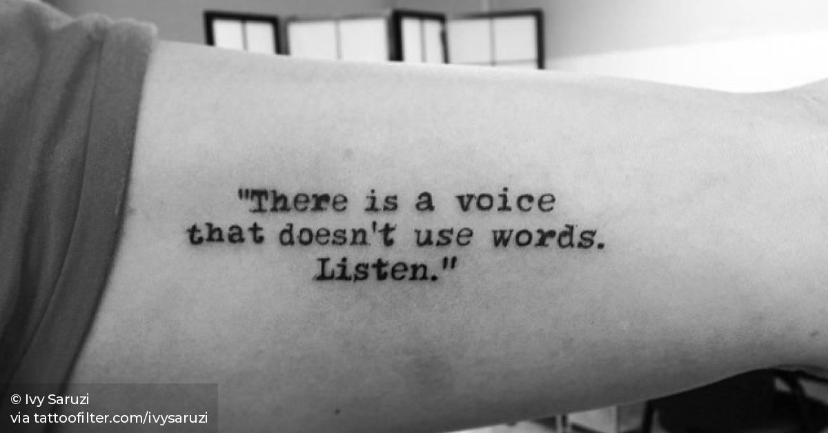 Inner arm tattoo saying "There is a voice that doesn't