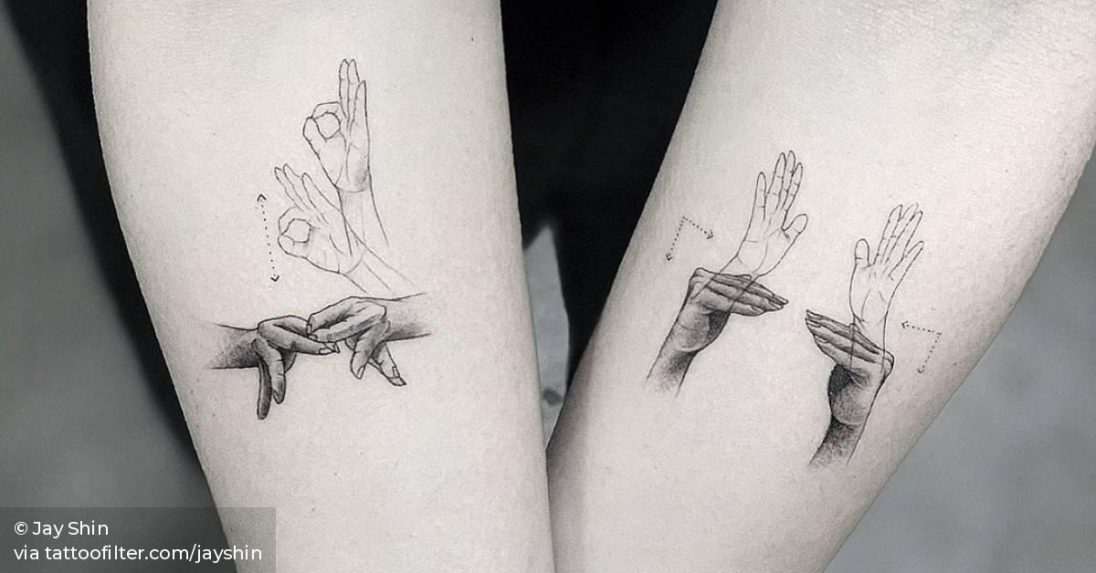 Matching faith & hope sign language tattoos.