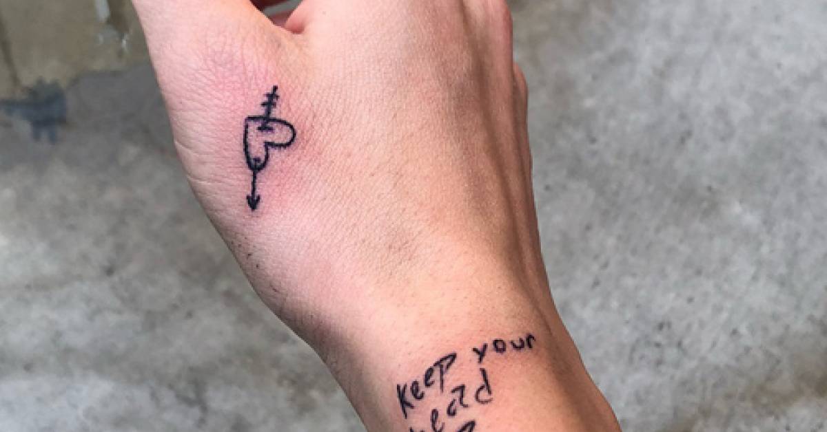 Bea Miller's right hand tattoo that says “keep your