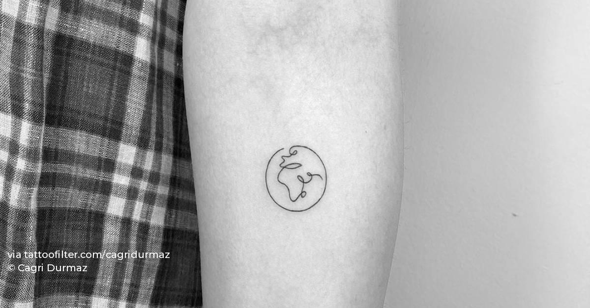 Continuous line earth tattoo on the inner forearm.