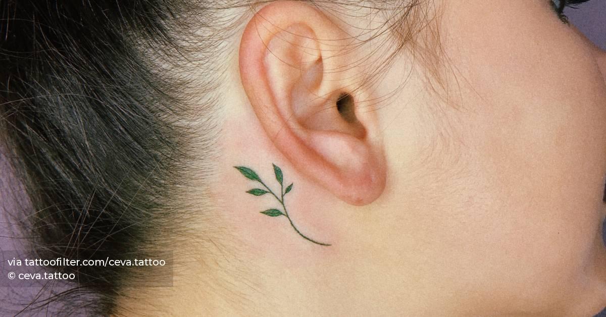 Leaves tattoo on neck