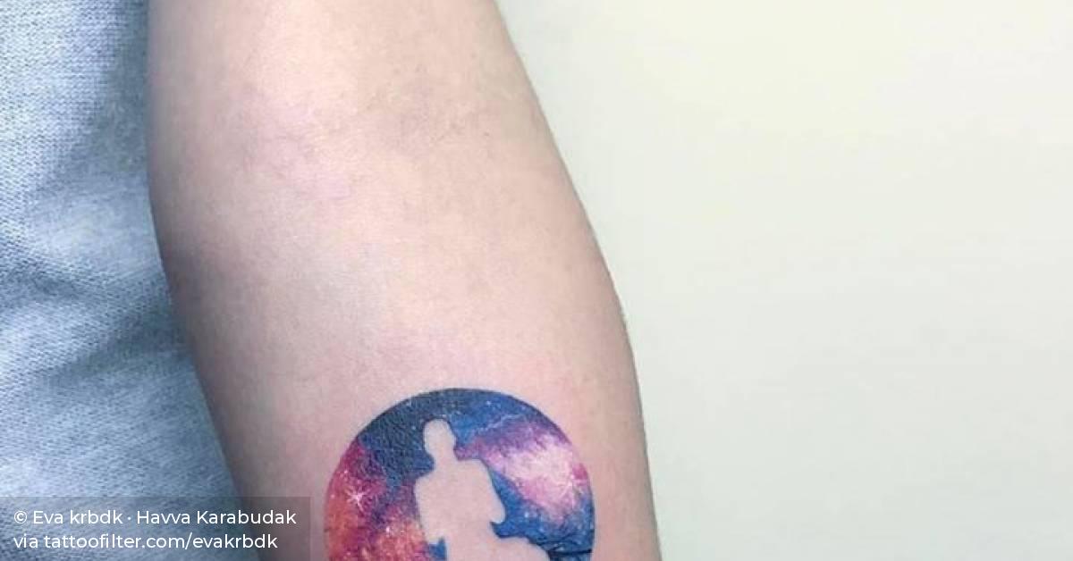 Meditating body shape circle tattoo on the left inner