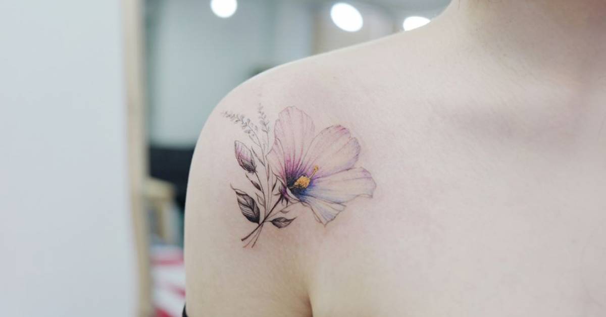 Hibiscus flower tattoo on the right shoulder.