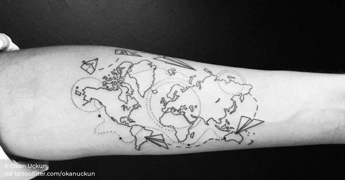 World map tattoo on the inner forearm.