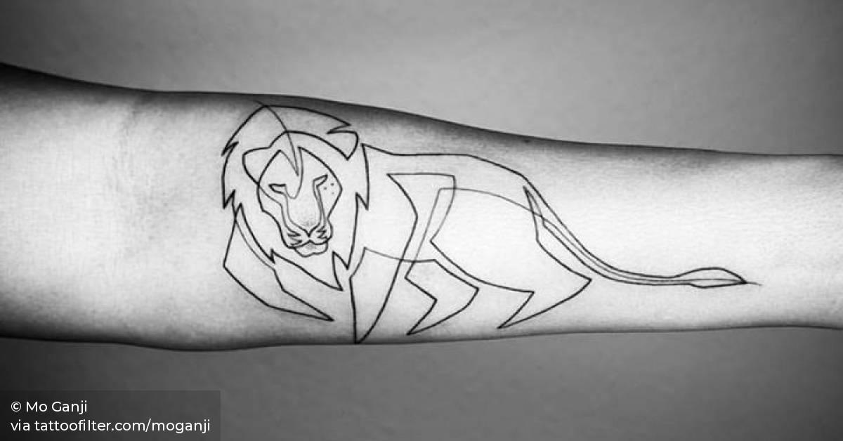 Continuous line lion tattoo on the left inner forearm.