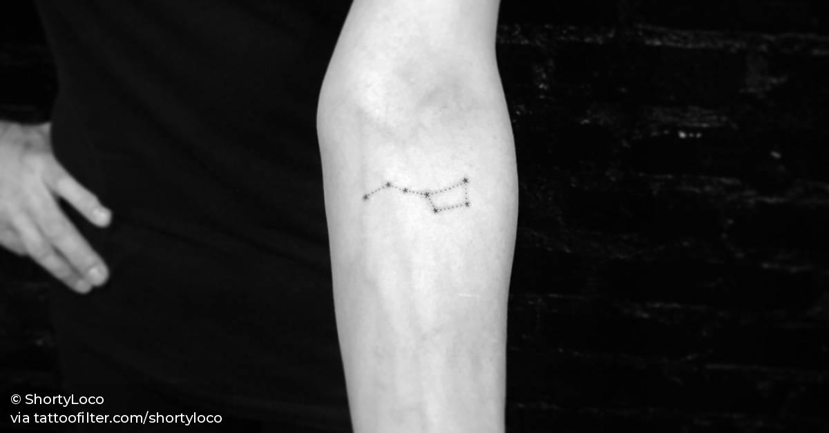 Big dipper tattoo on the left inner forearm.