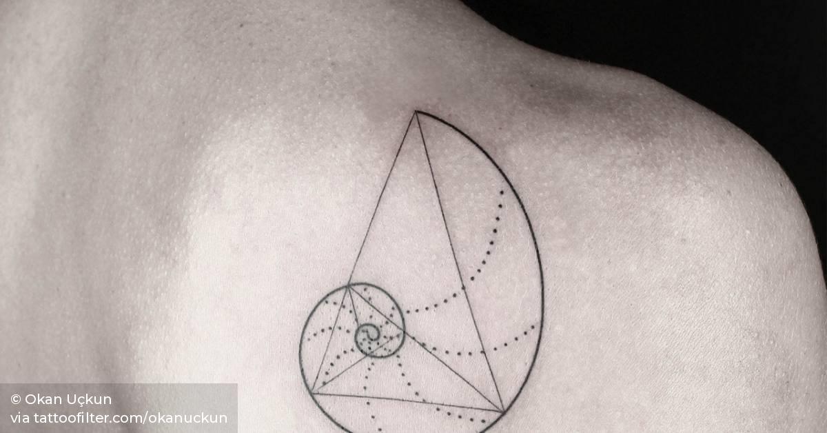 Geometric style snail shell tattoo.