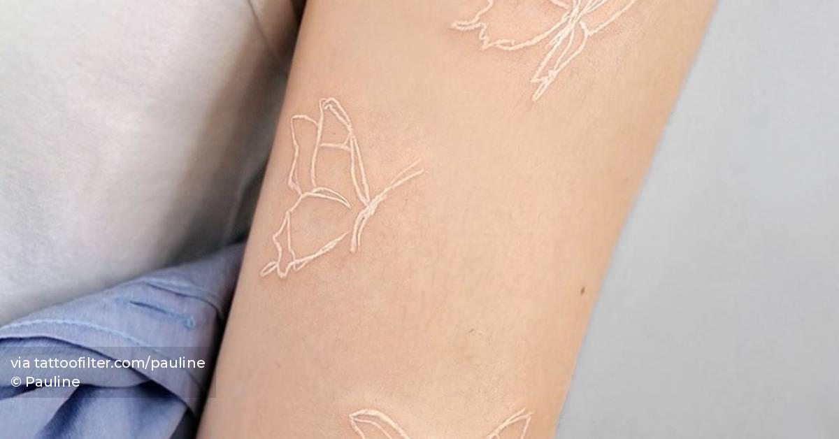 Butterflies in white ink tattoo