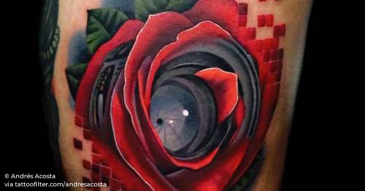Camera lens rose tattoo on the calf.