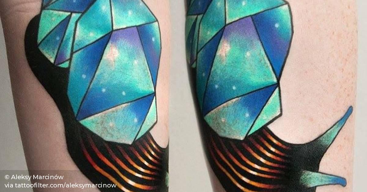 Crystal snail on the forearm.