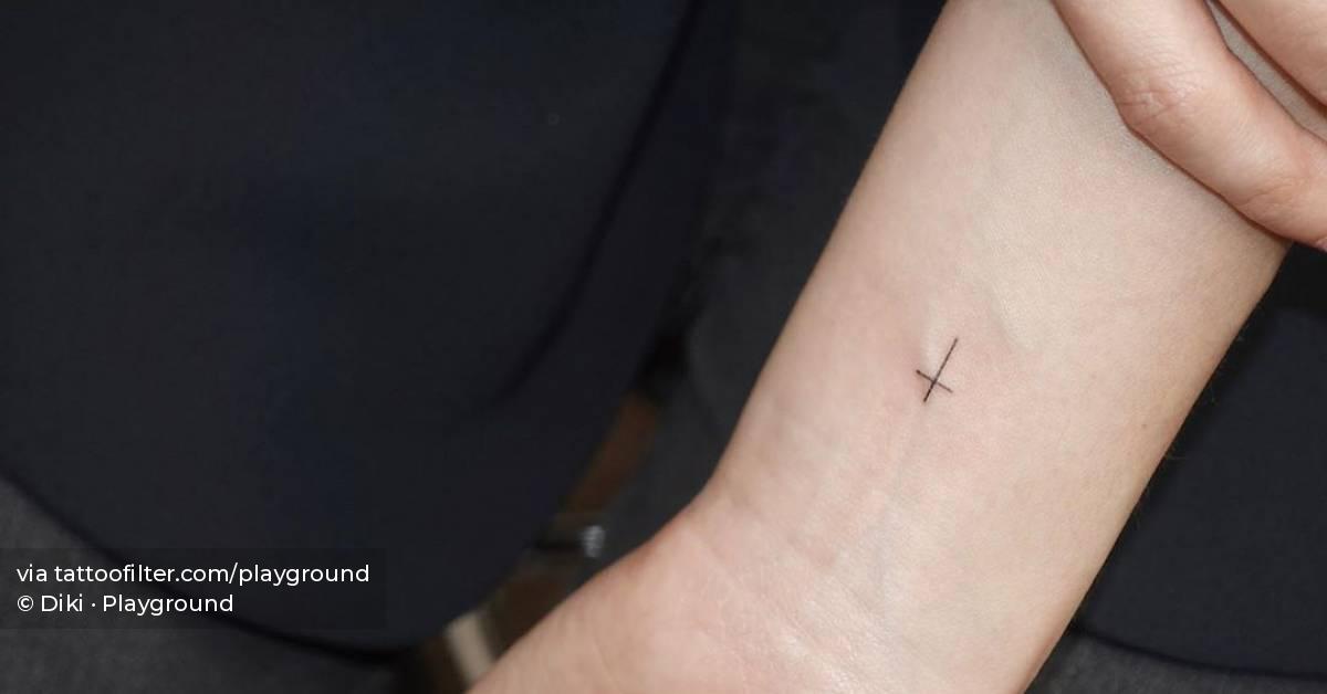 Minimalist Cross Tattoo On Wrist