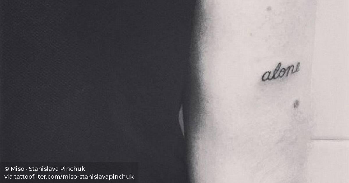 Hand poked “Alone” tattoo on the back of the Sam