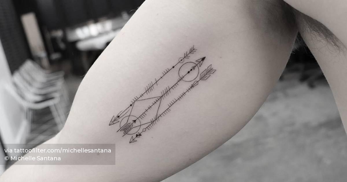 Fine line arrows tattoo on inner arm