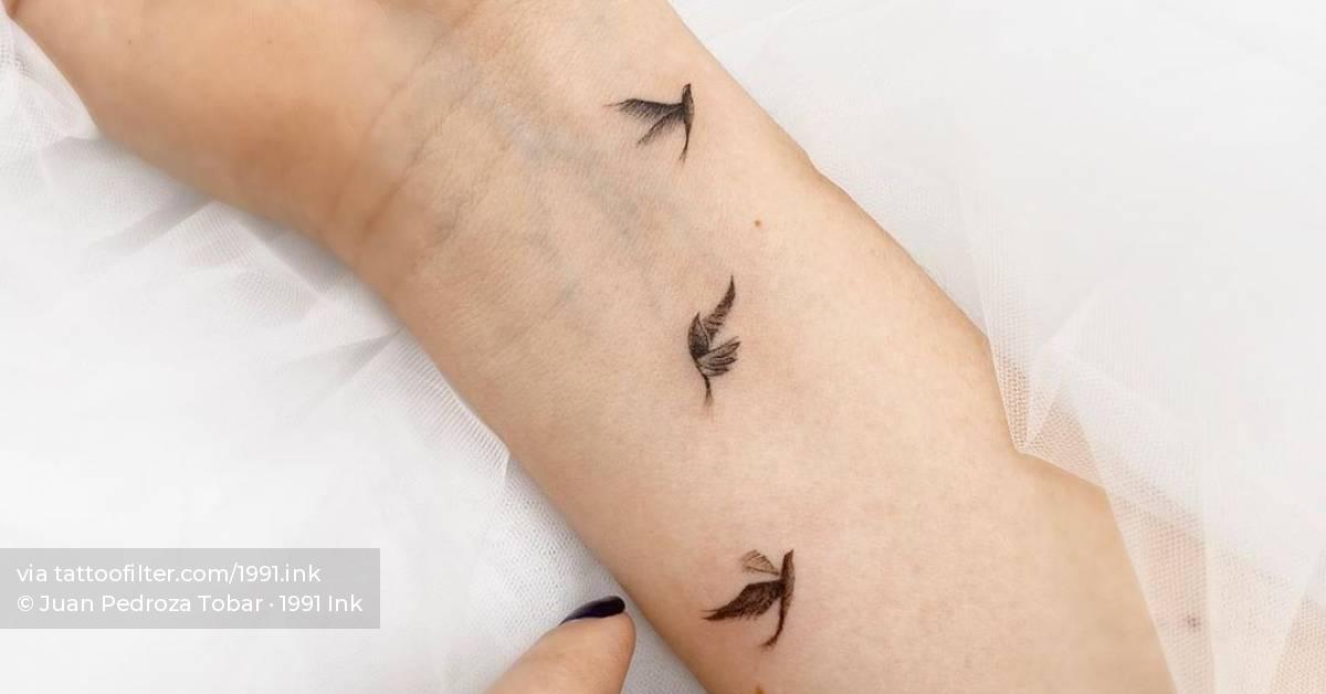 Single needle swallows tattoo