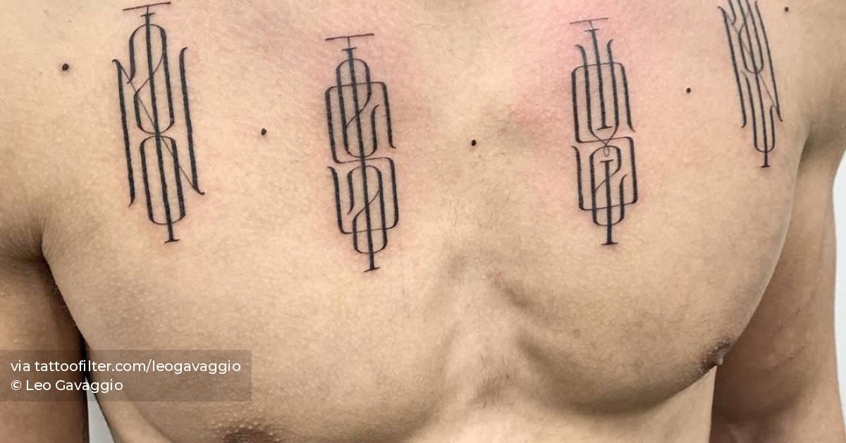 Monogram tattoos on chest