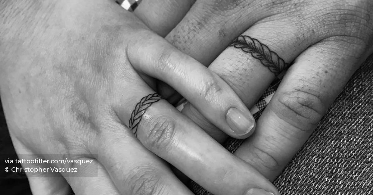 Couple matching ring tattoos
