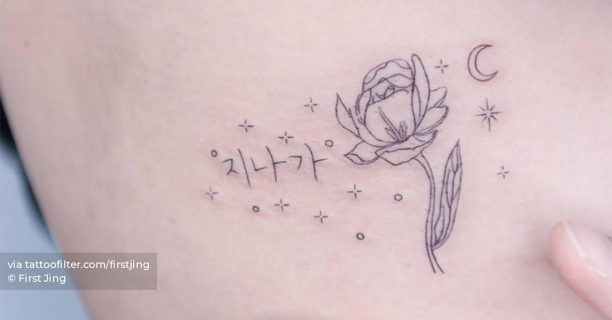 Fine line peony tattoo on rib