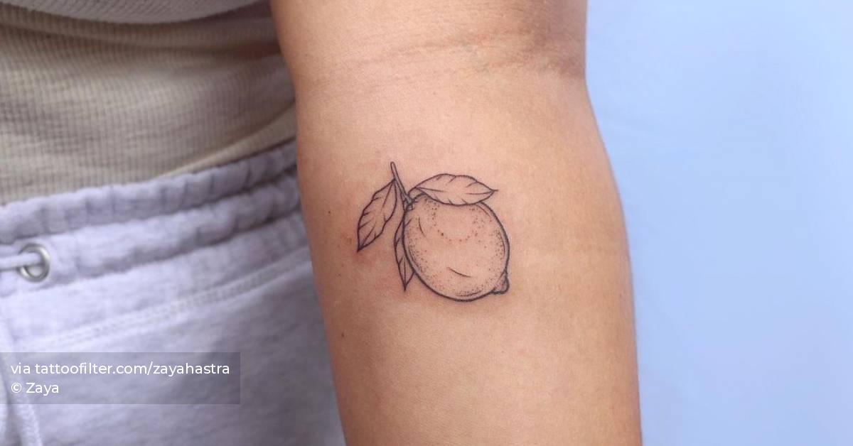 Little lemon tattoo on inner forearm