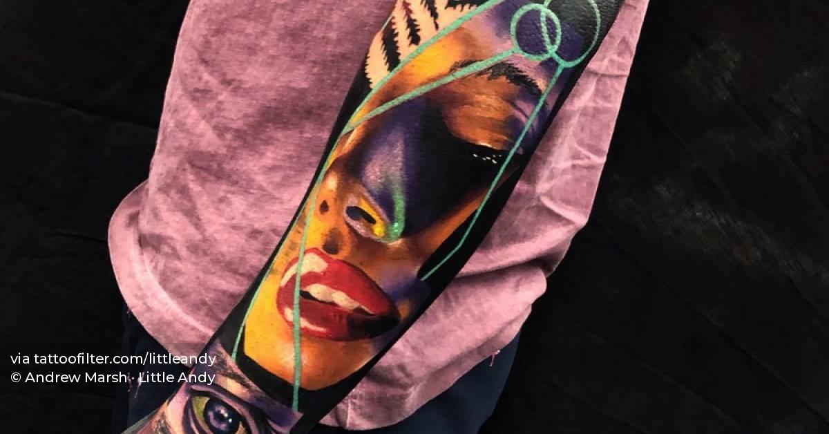 Surrealist tattoo on forearm and hand