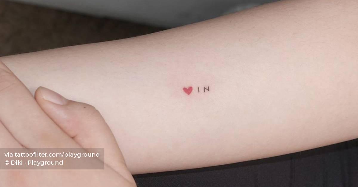 Red Heart and lettering tattoo