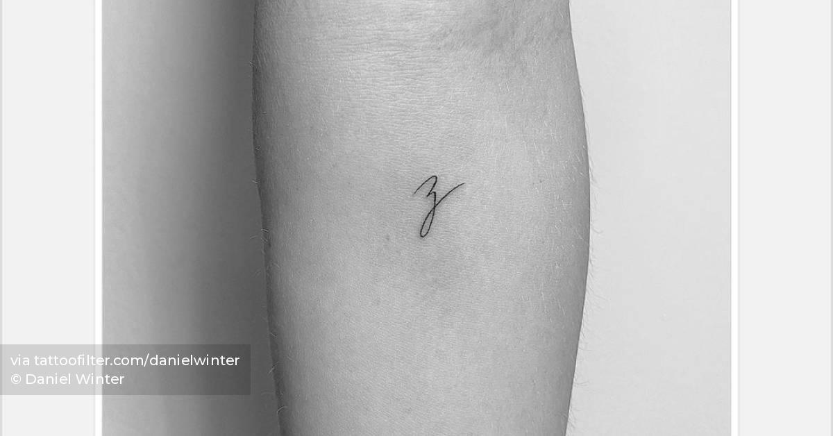 Letter "Z" tattoo on the inner forearm