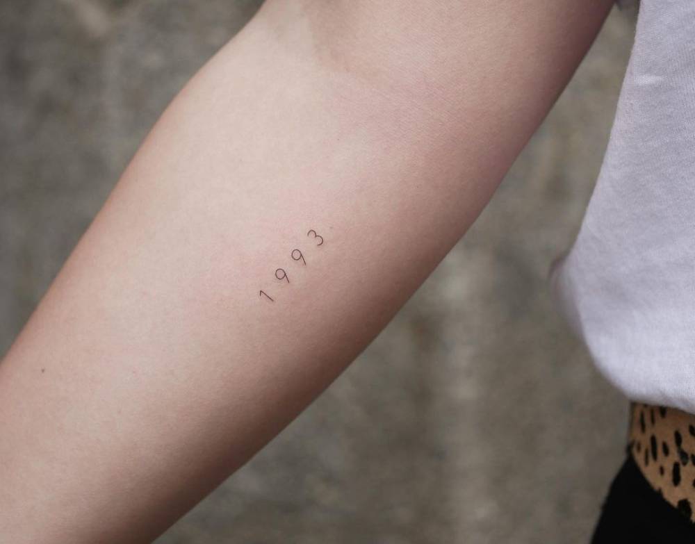 1993 Lettering Tattoo On The Inner Forearm 1993 Lettering Tattoo On The Inner Forearm