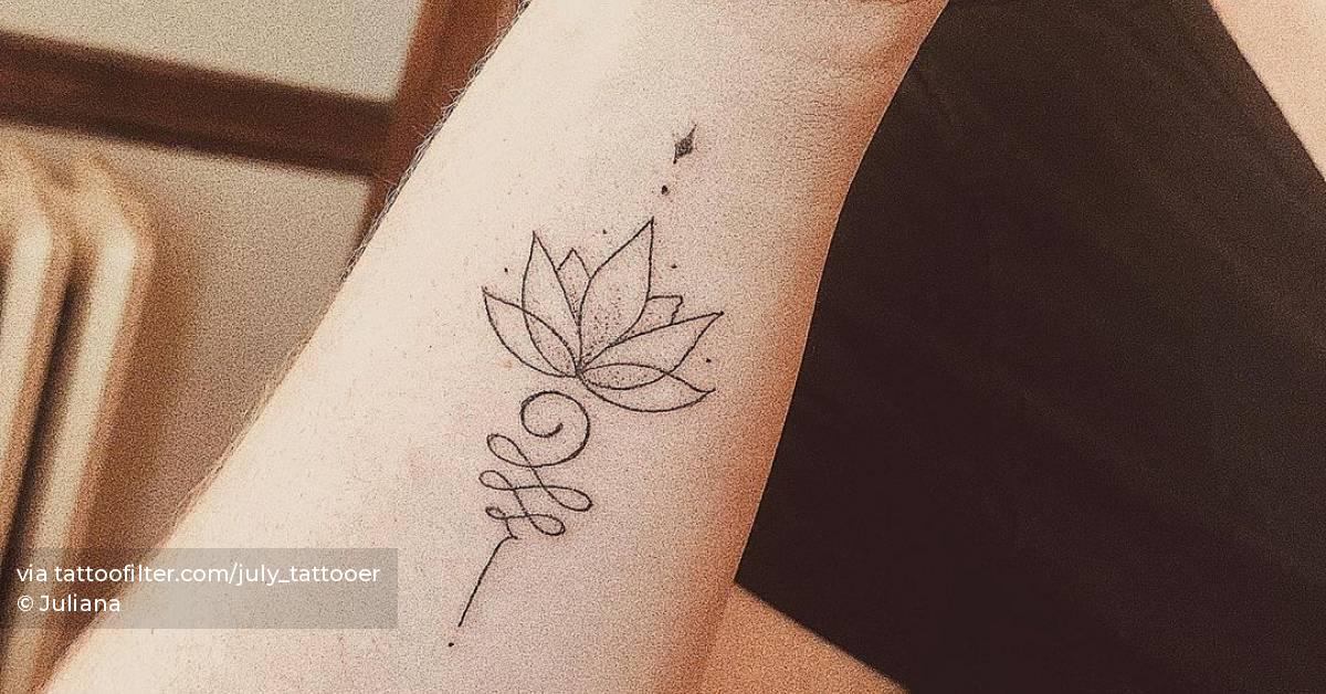 Lotus unalome tattoo in fine line