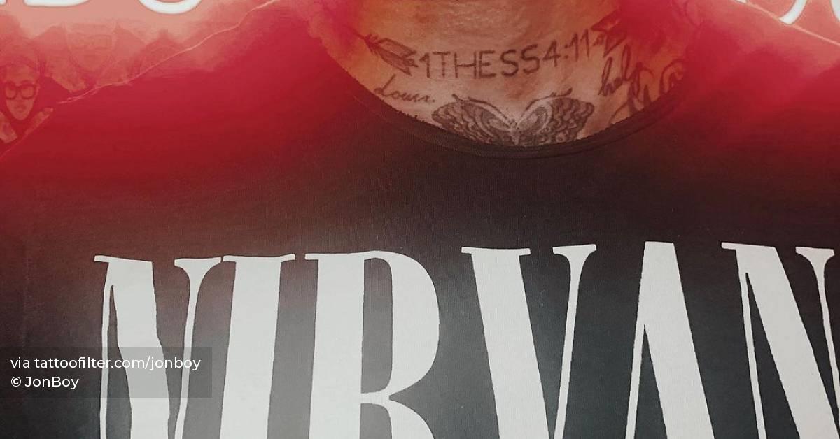 "Kintsukuroi" lettering tattoo on Tim Howard's