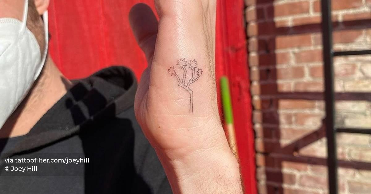Single needle Joshua tree tattoo on the hand