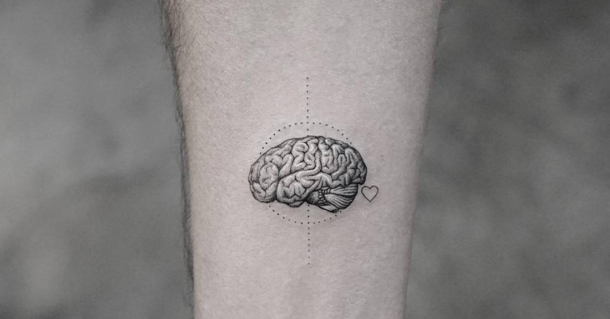 Single needle brain tattoo on the right inner forearm.