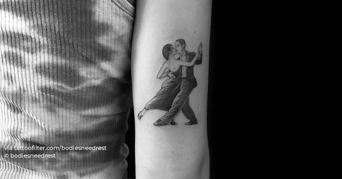 Tango dancers tattooed on the tricep