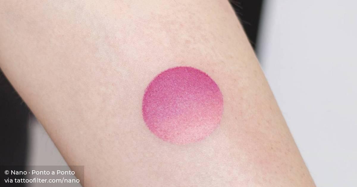 Hand poked ink spectrum circle tattoo on the left inner