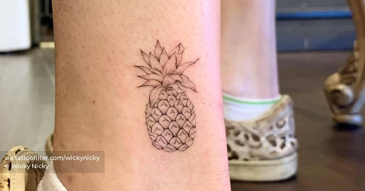 Fine line pinneaple tattoo on the ankle