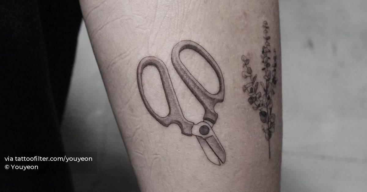 Scissors tattoo on