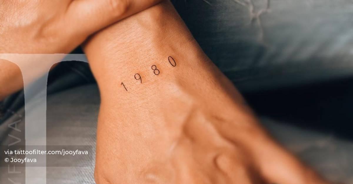 "1980" tattooed on the wrist