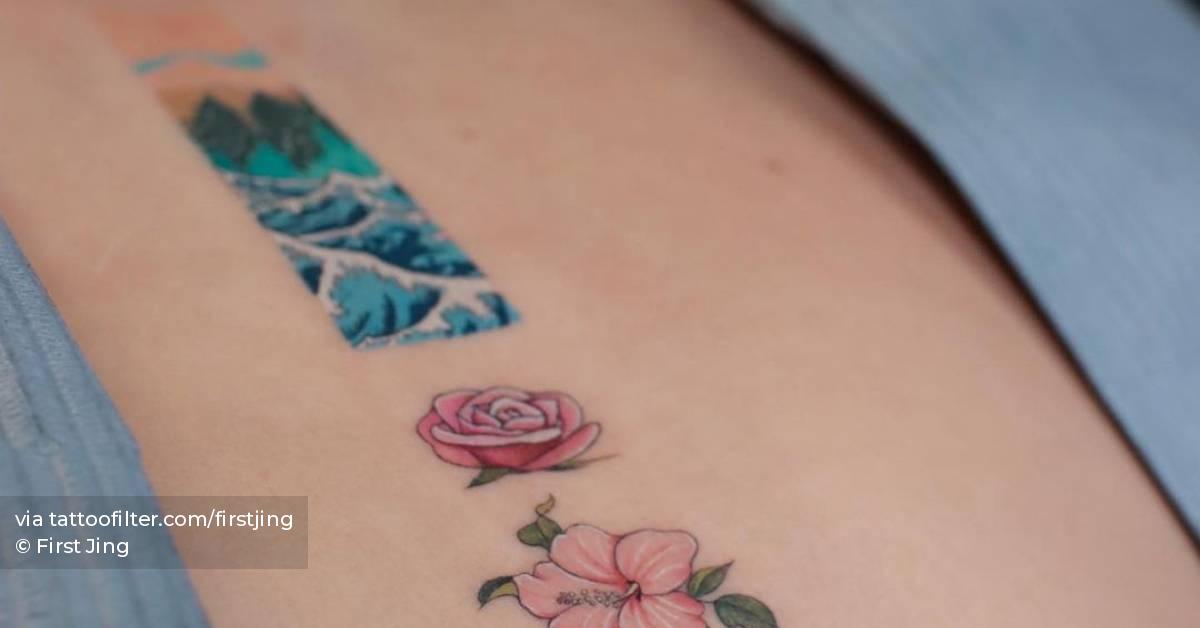 Illustrative flowers tattoo on the back