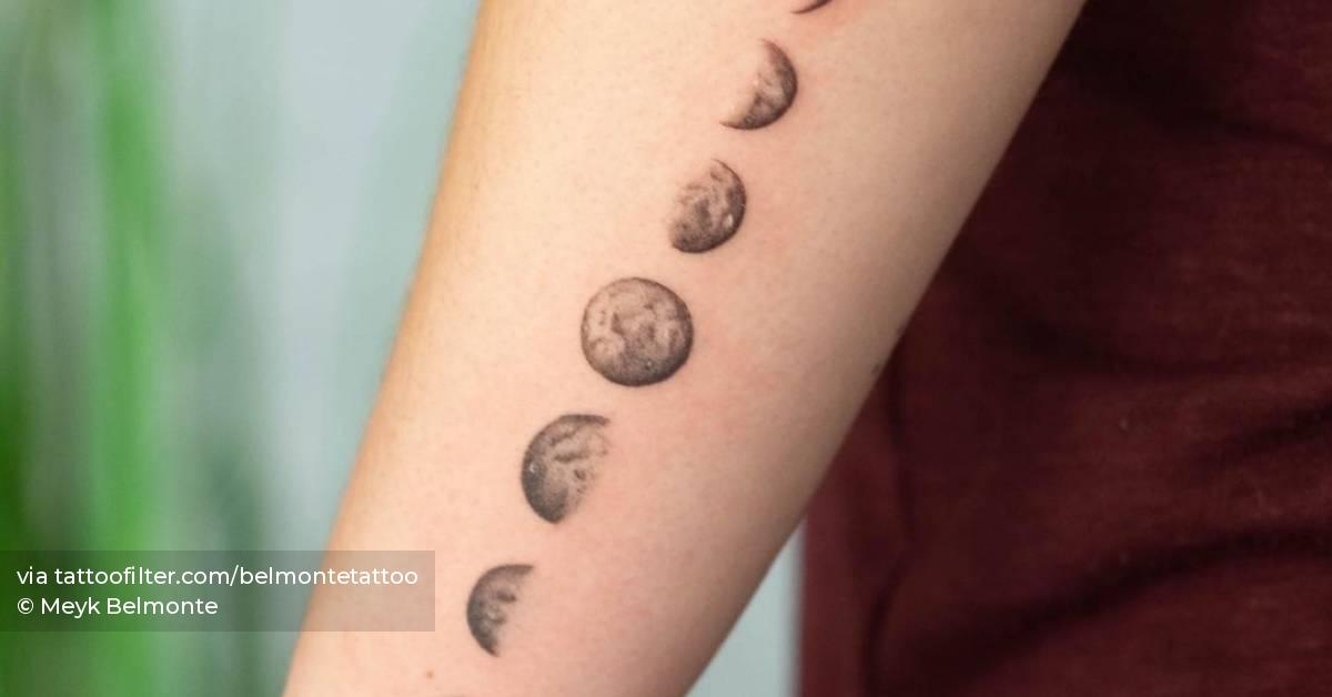 Moon phases tattoo on the forearm