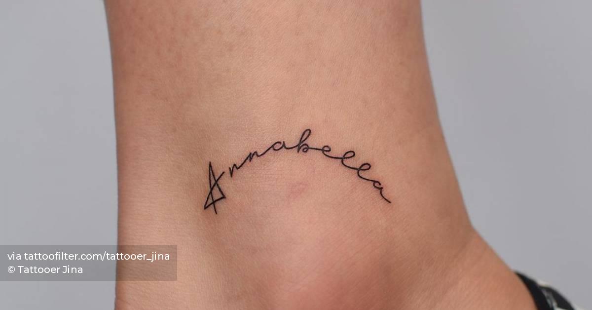 "Annabella" lettering tattoo on the ankle