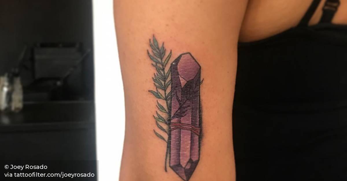 Amethyst and Rosemary tattoo on the back of the left