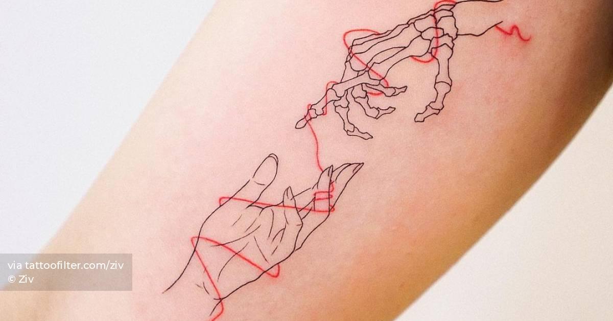 Fine line hands tattoo on the inner arm