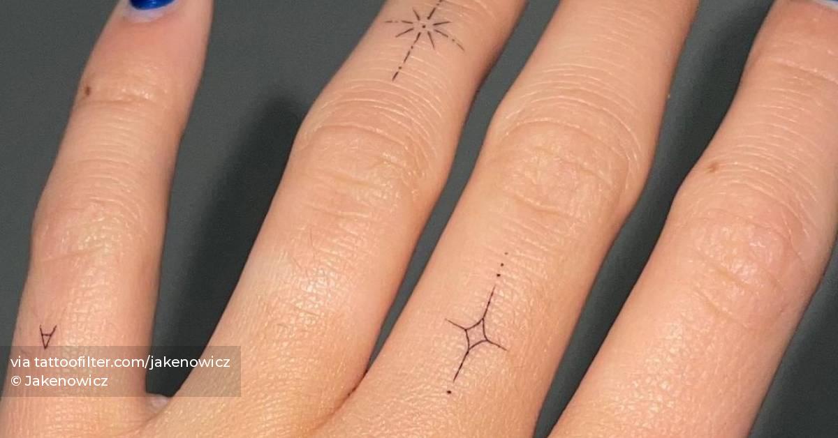 Single needle stars and letter "A" tattooed on the