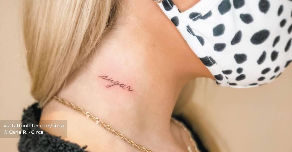 "Sugar" lettering tattoo on the neck