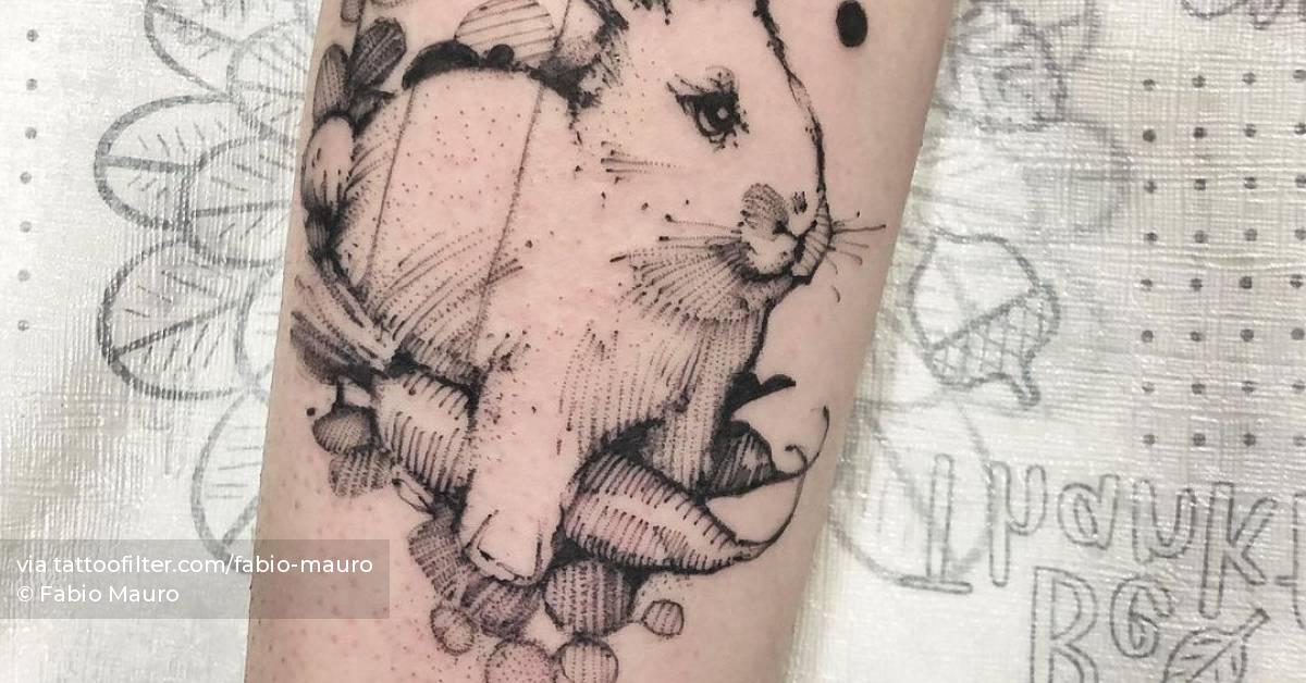 Sketch work rabbit tattoo on the calf