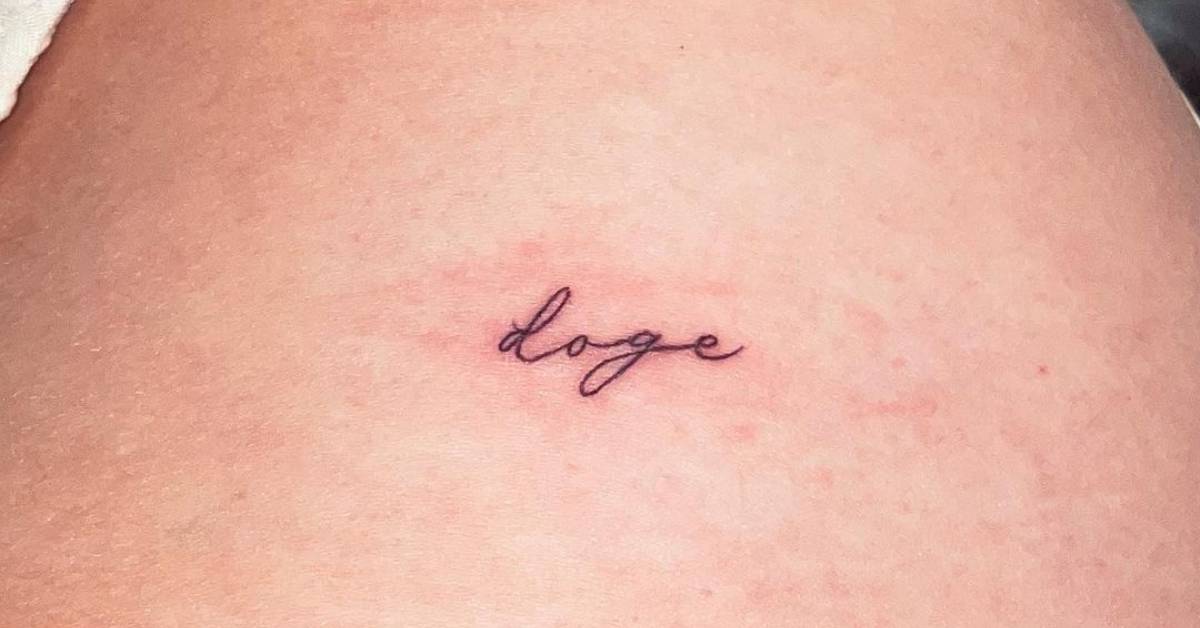 "Doge" lettering tattoo on Corinna Kopf's butt cheek.