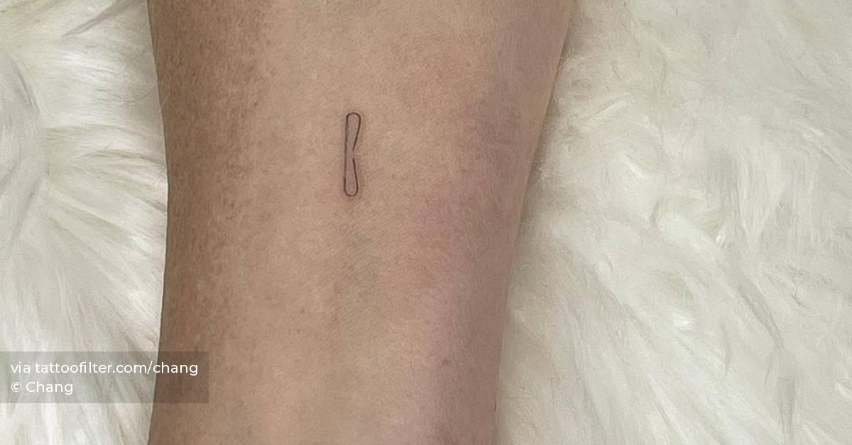 Minimalist staple tattoo in memory of her late son and