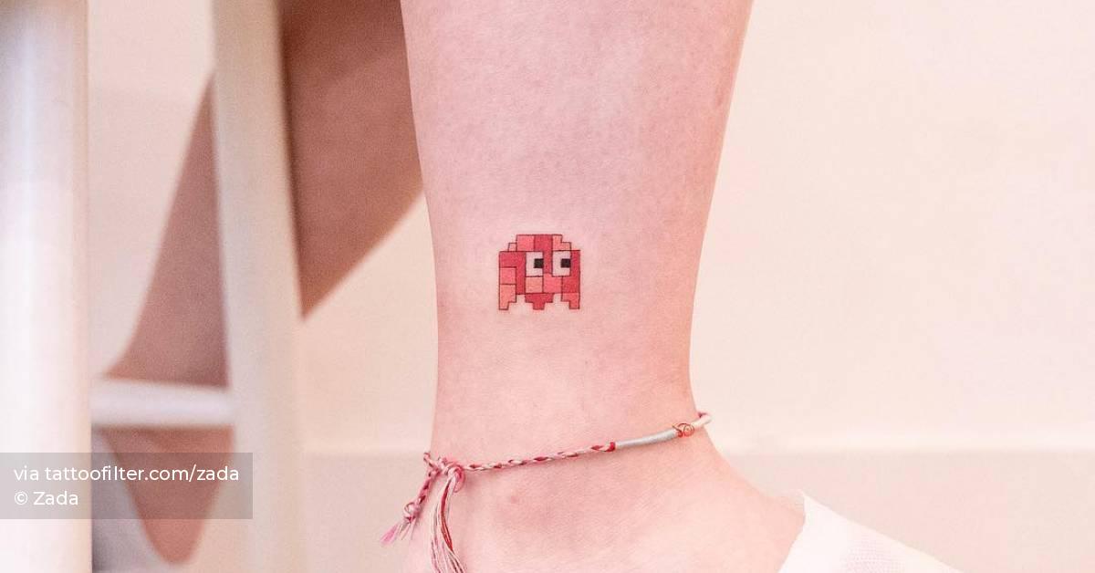 Pac Man's ghosts tattoo on the ankle.