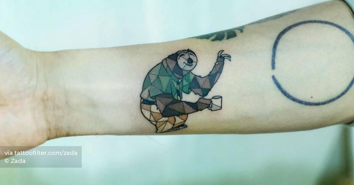 Zootopia tattoo on the inner forearm.