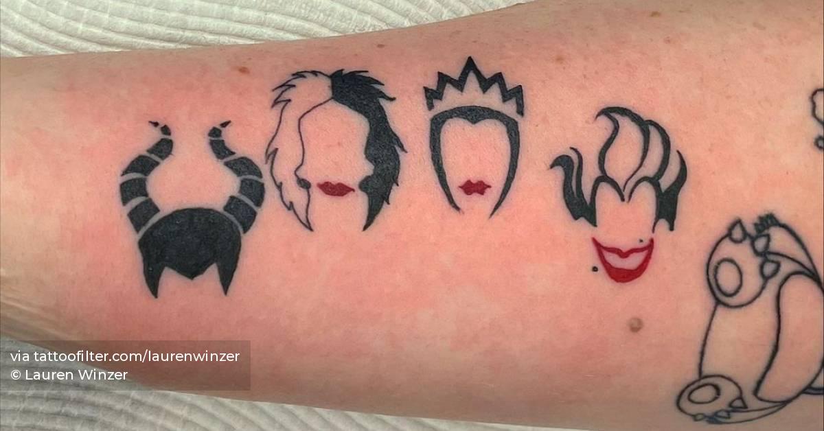 Disney villains tattoo on the inner arm.