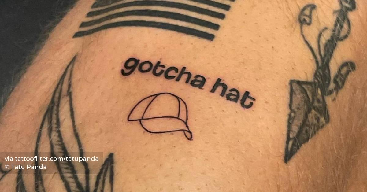 "Gotcha hat" tattoo on Jake Paul's shin.